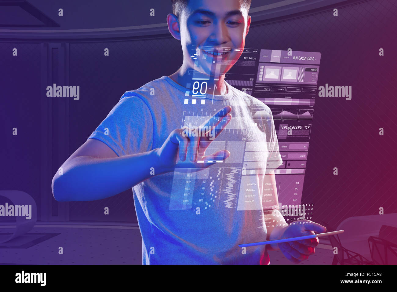 Happy IT student smiling and easily making a hologram Stock Photo - Alamy