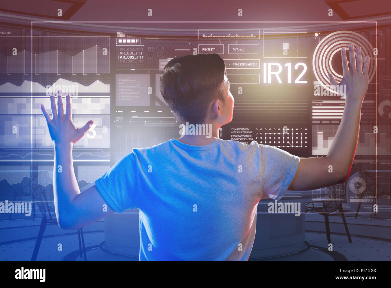 Experienced web developer touching the screen while working alone Stock ... Experienced web developer touching the screen while working alone Stock ...