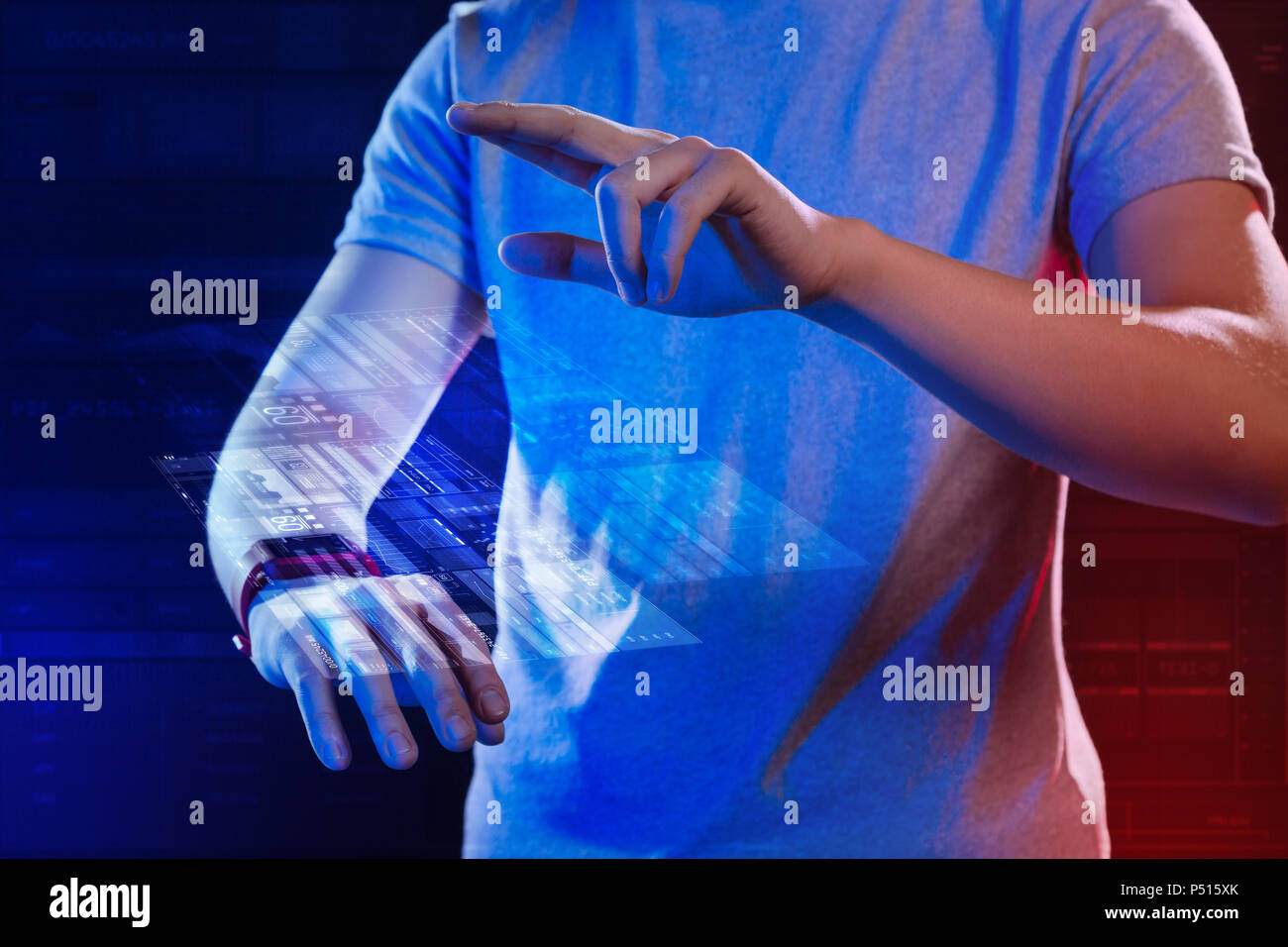 Young man putting his hand up while working with projections Stock ...