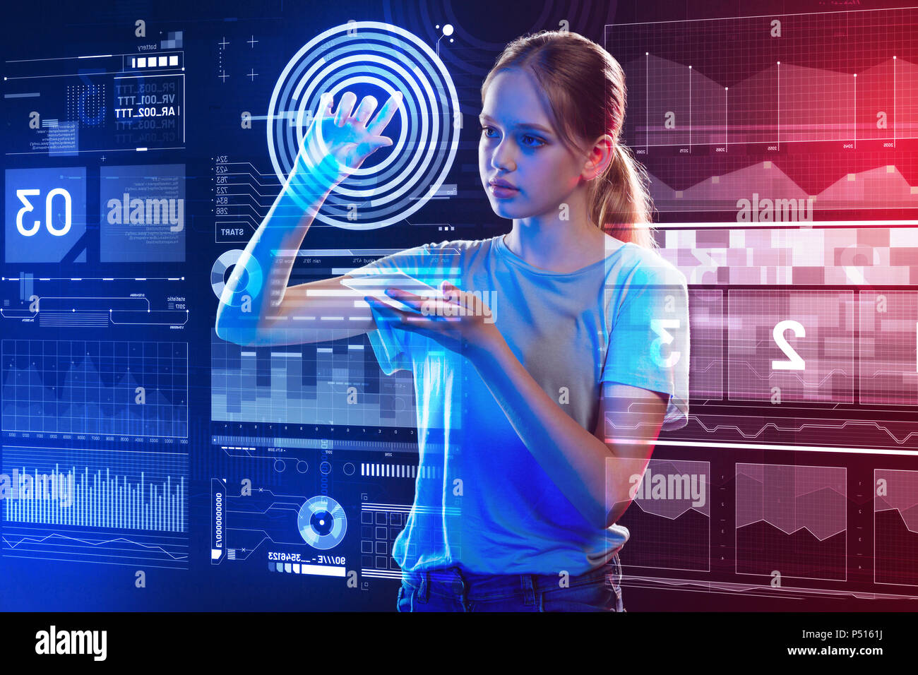 Curious young girl touching the screen while analyzing the projection ...