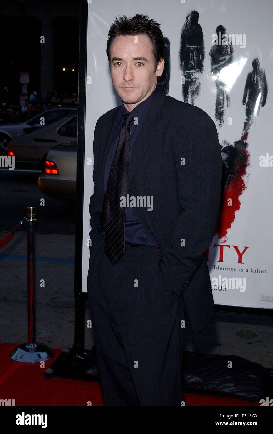 John Cusack arriving at the Premiere of " Identity " at the Grauman ...