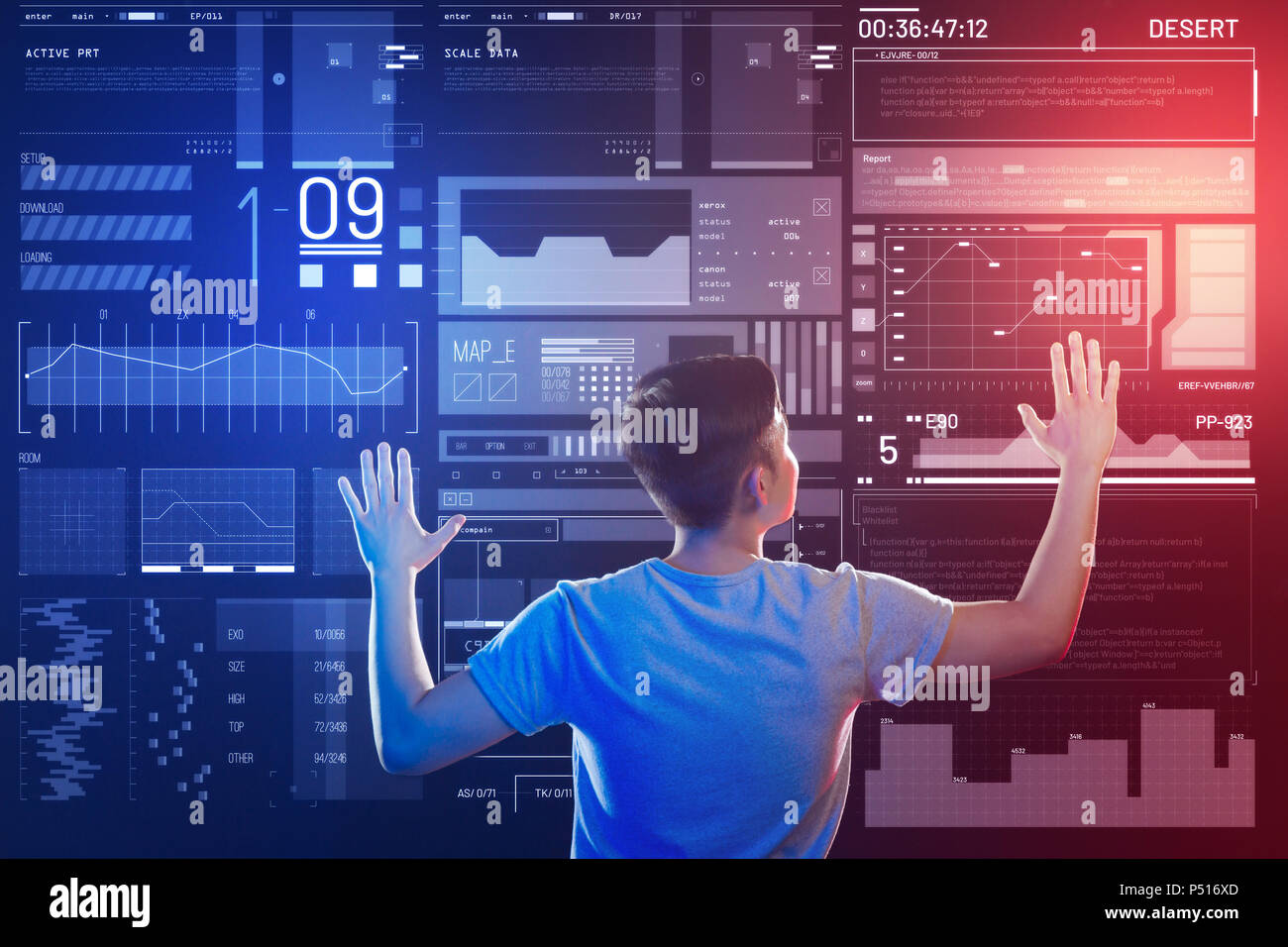 Calm software developer touching the screen while working in the office Stock Photo - Alamy