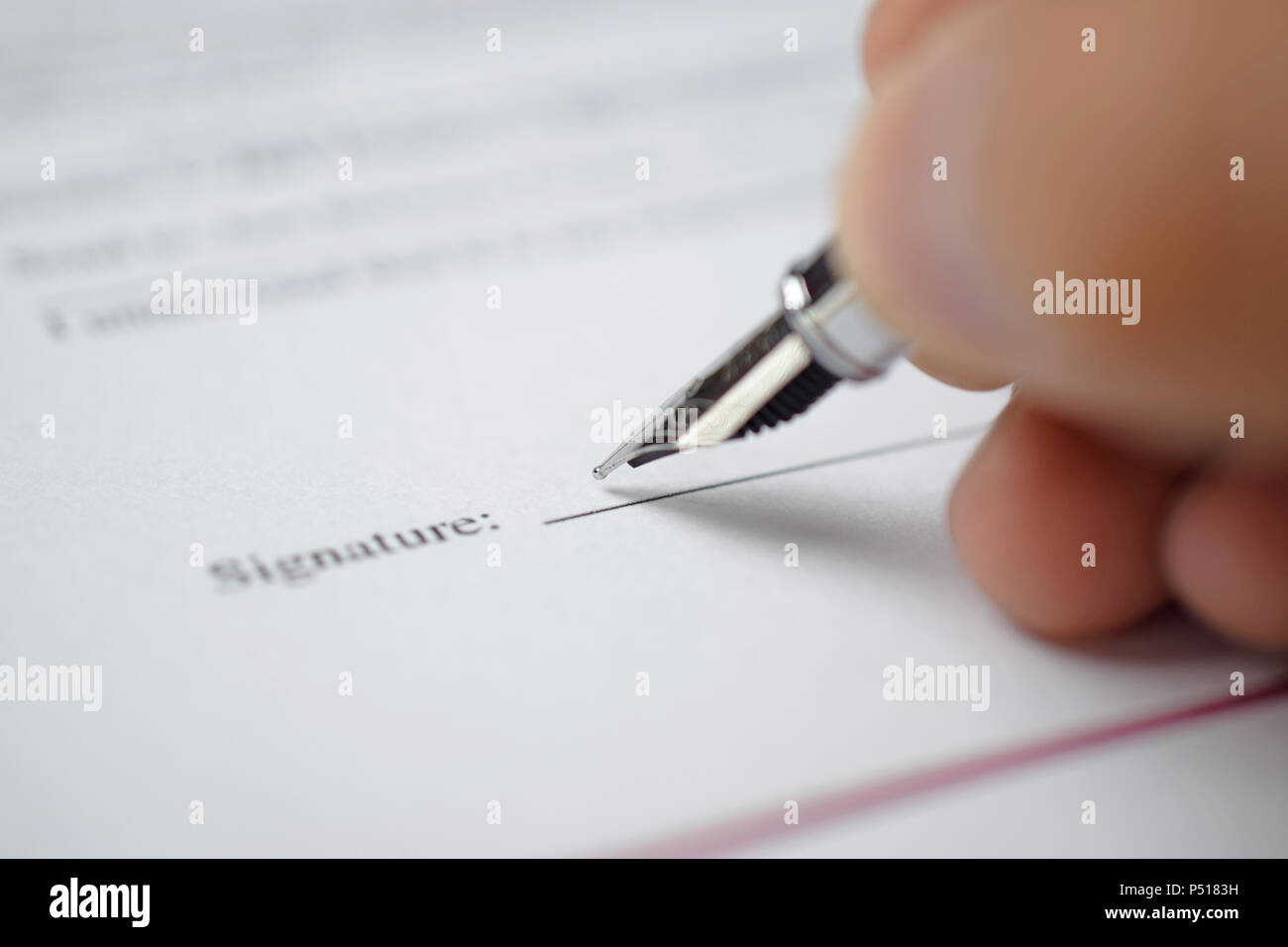 Signing a form, closeup Stock Photo - Alamy