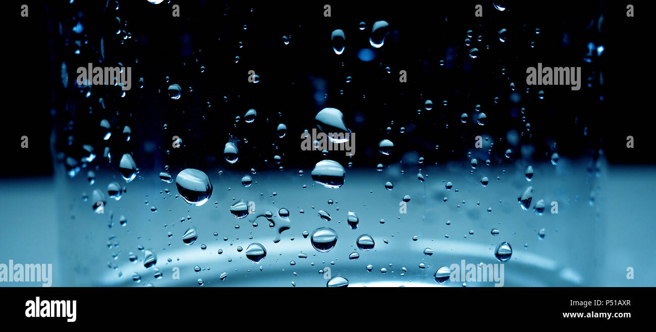 Water drops over blue glass background, banner for website Stock Photo ...