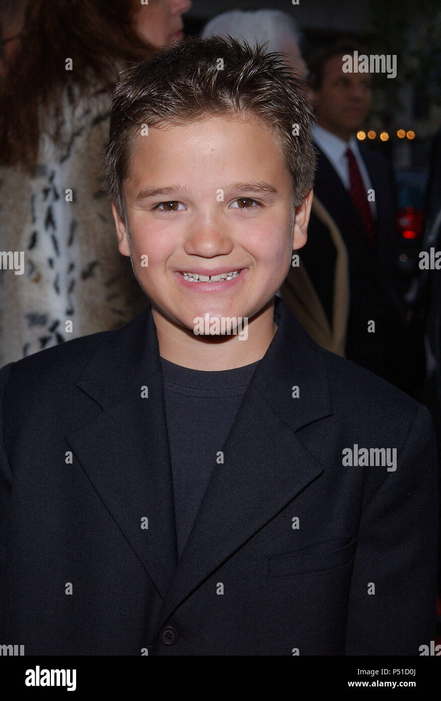 Brett Loehr arriving at the Premiere of " Identity " at the Grauman ...