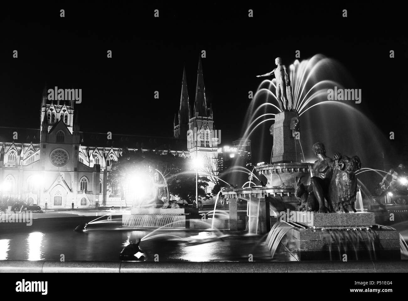 Water fountain with catholic cathedral church background under the ...
