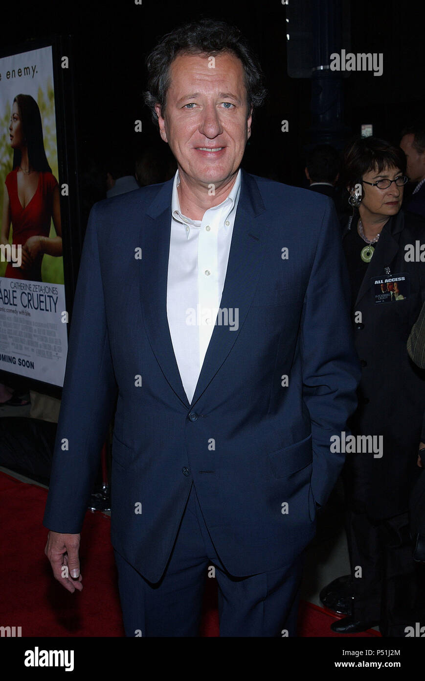 Geoffrey Rush arriving at the " Intolerable Cruelty " Premiere at the ...
