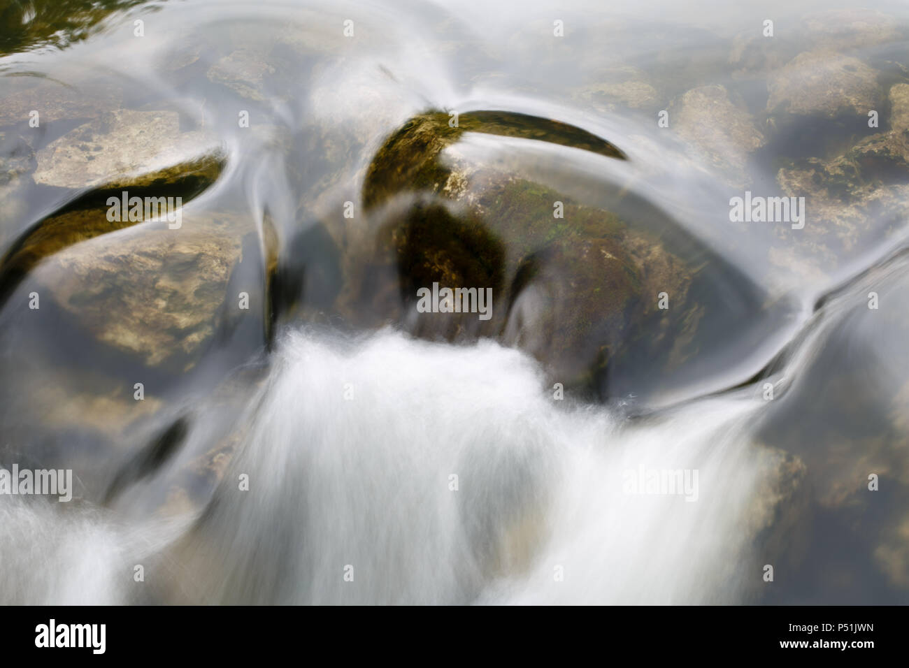 Water flowing in the stream Stock Photo - Alamy