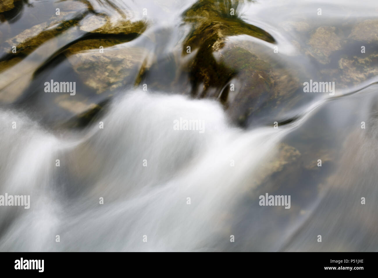 Water flowing in the stream Stock Photo - Alamy