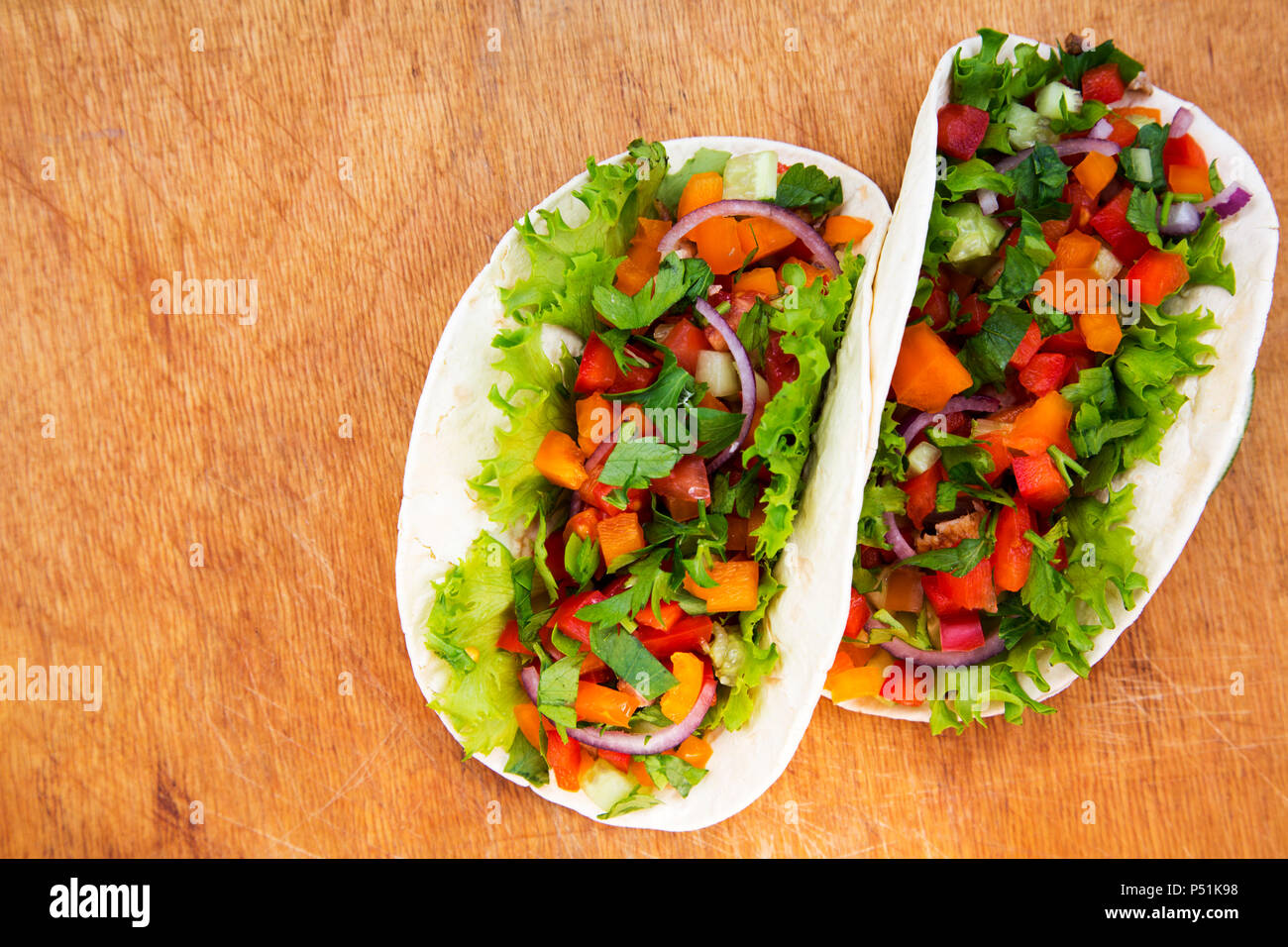 Beef tacos with salad and pepper. Top view. From above, overhead. Copy ...