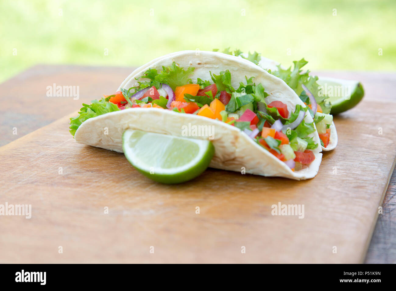 Mexican pork tacos on wooden rustic background. Tacos al pastor. Side ...