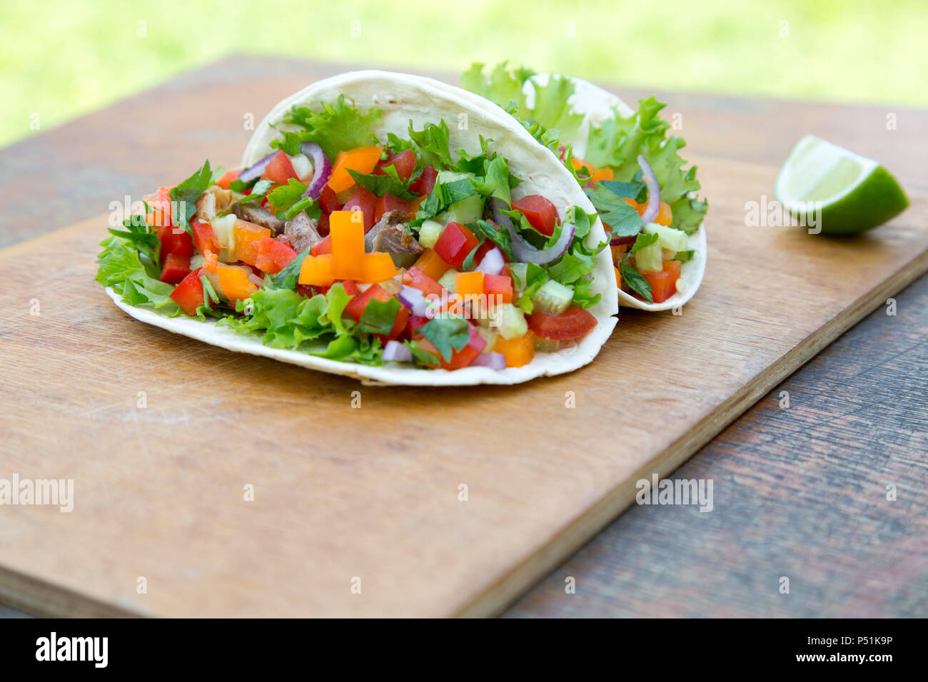 Mexican street pork tacos on wooden rustic background. Tacos al pastor ...