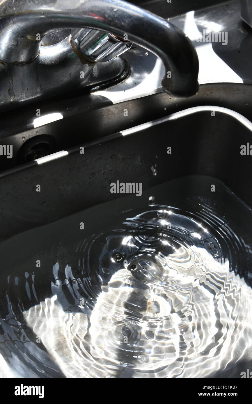 Dripping taps hi-res stock photography and images - Alamy