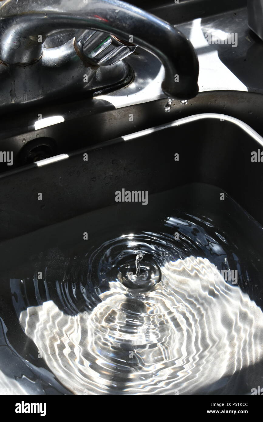 Dripping taps hi-res stock photography and images - Alamy