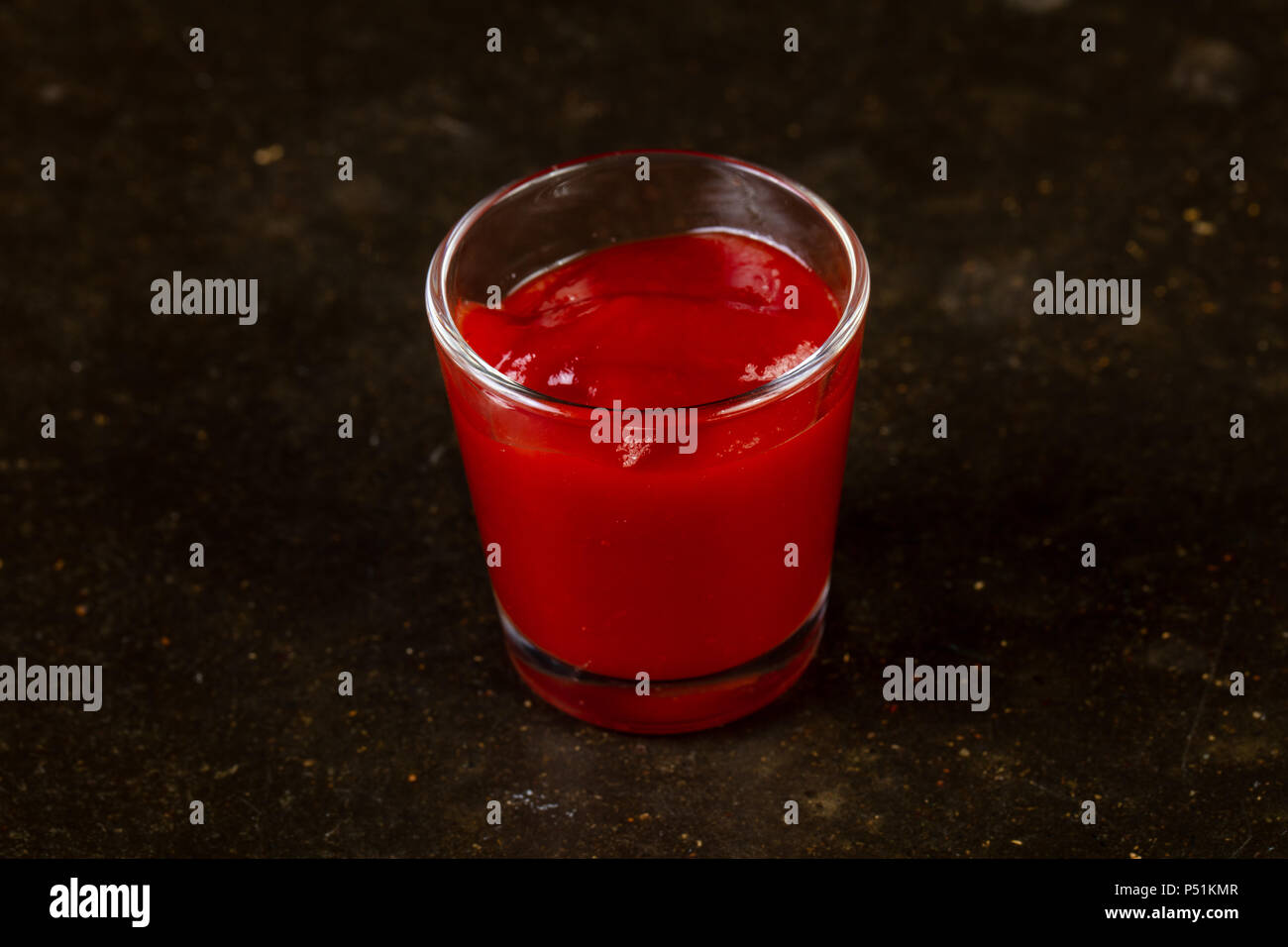 Ketchup sauce in the glass portion Stock Photo - Alamy
