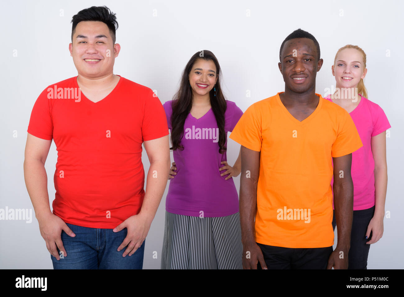 Happy diverse group of multi ethnic friends smiling and standing Stock ...