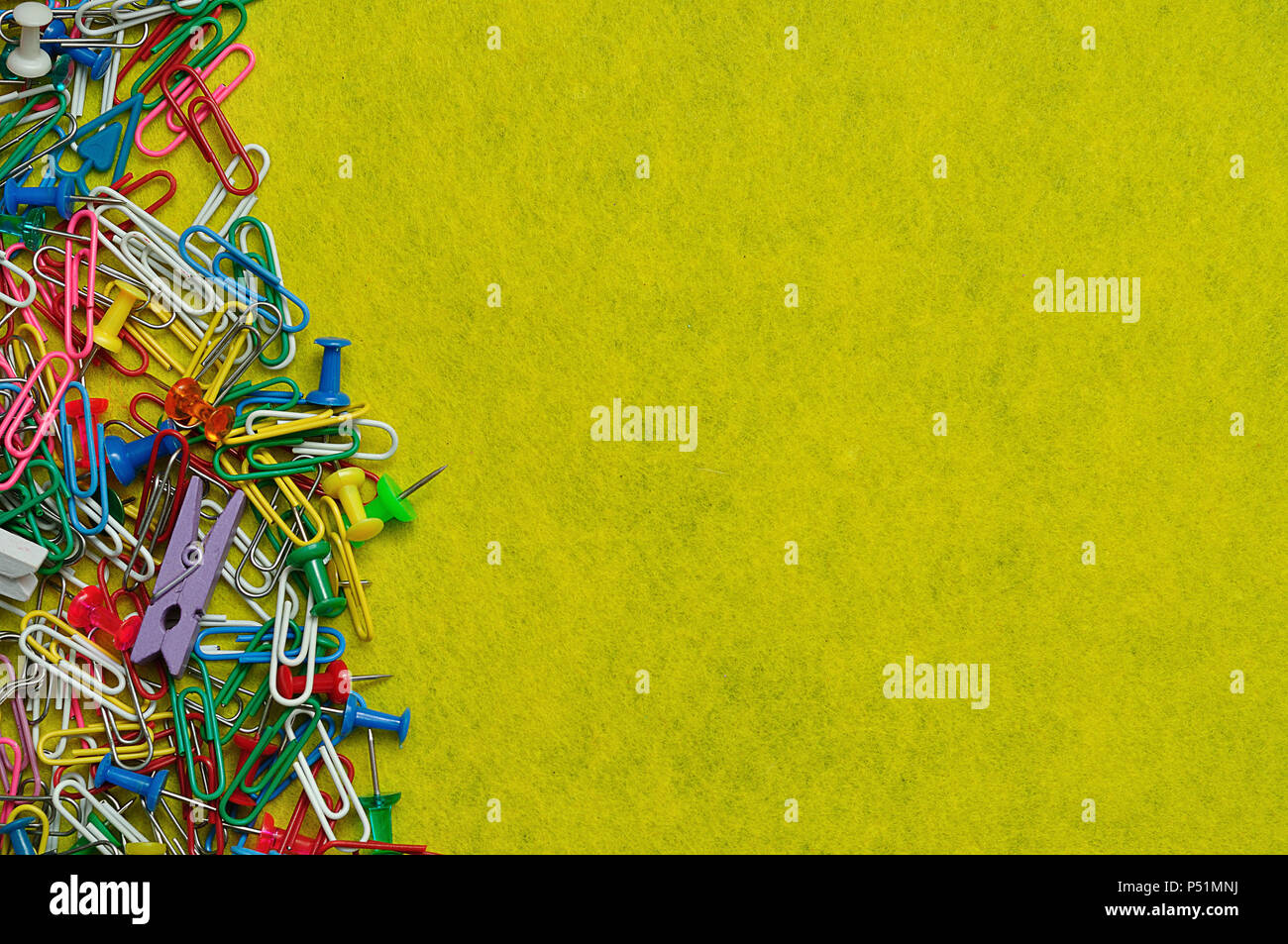 A collection of stationery on a yellow background Stock Photo - Alamy