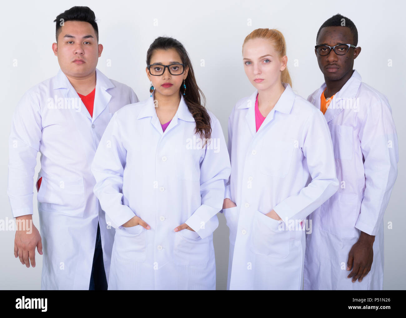 Studio shot of diverse group of multi ethnic doctors standing to Stock ...
