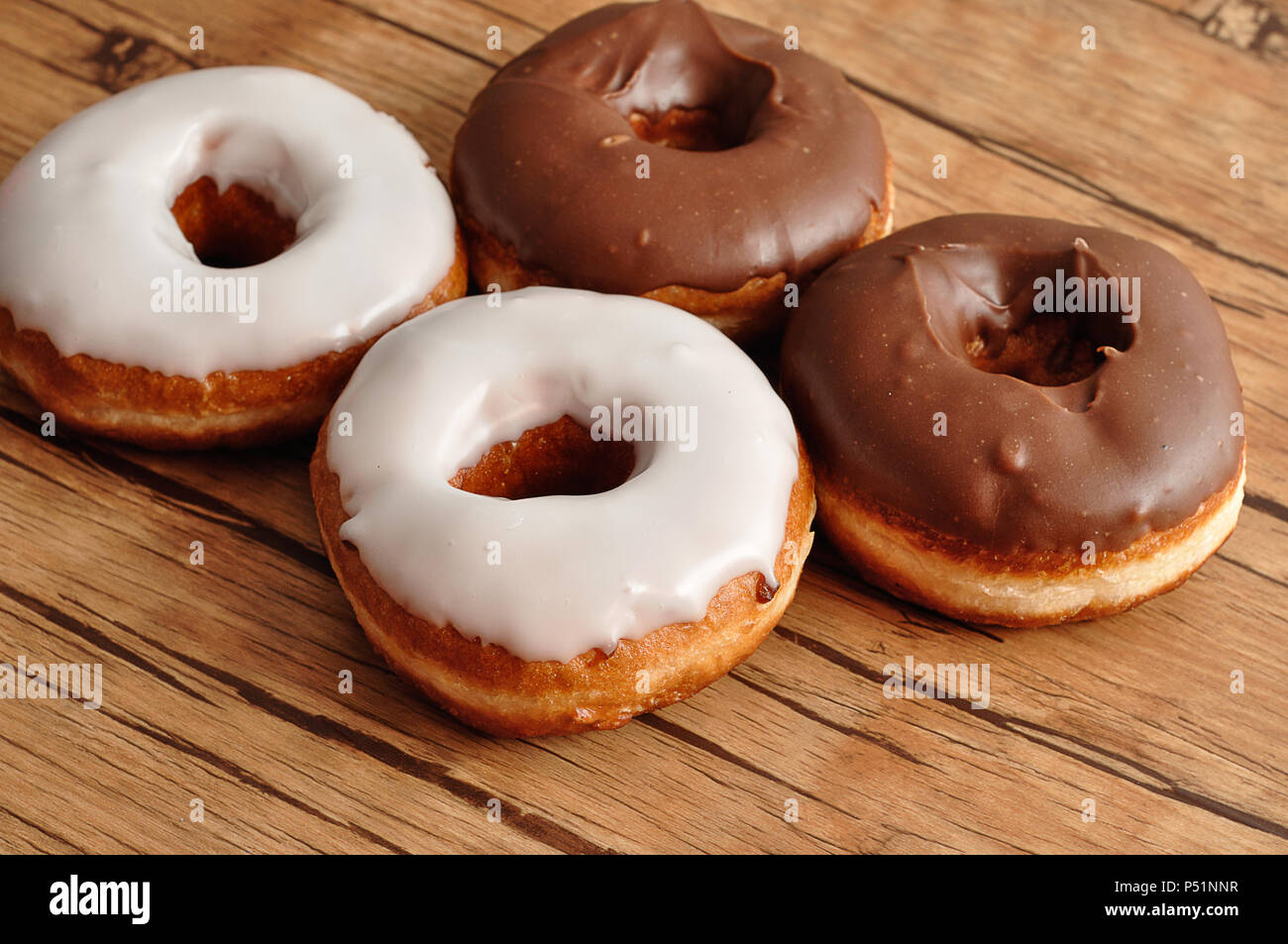 Four doughnuts hi-res stock photography and images - Alamy