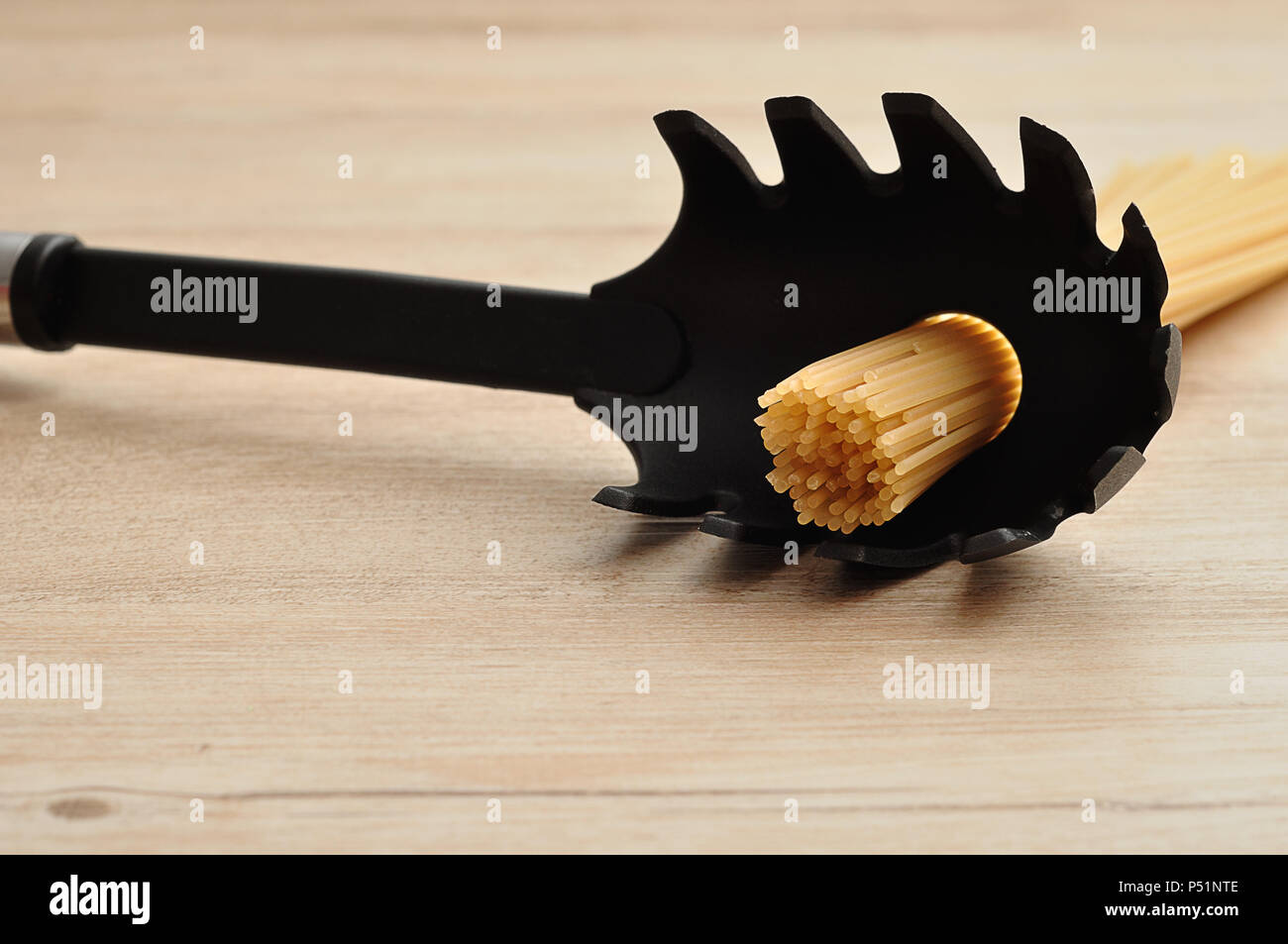 Spaghetti spoon measure hi-res stock photography and images - Alamy