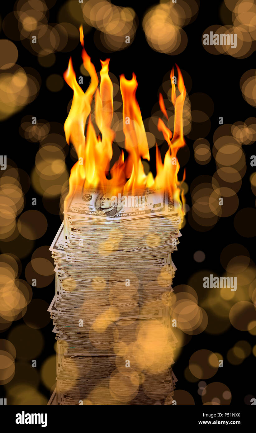 close up shot of burning money pile over black background Stock Photo ...