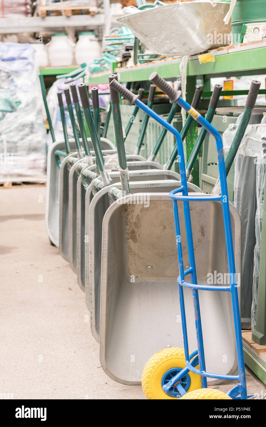 Modern wheelbarrows hi-res stock photography and images - Alamy