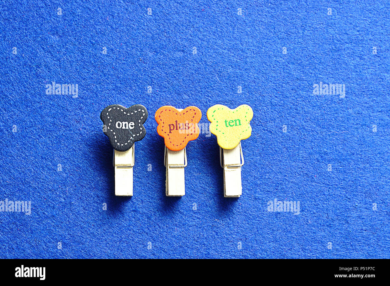 One plus ten on a blue background Stock Photo - Alamy