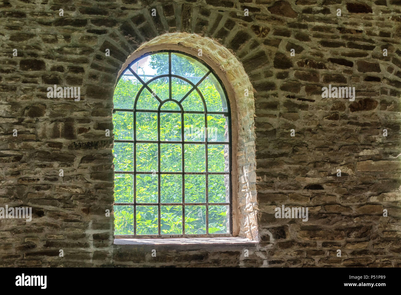 Historic old cast-windows in an old abandoned factory Stock Photo - Alamy