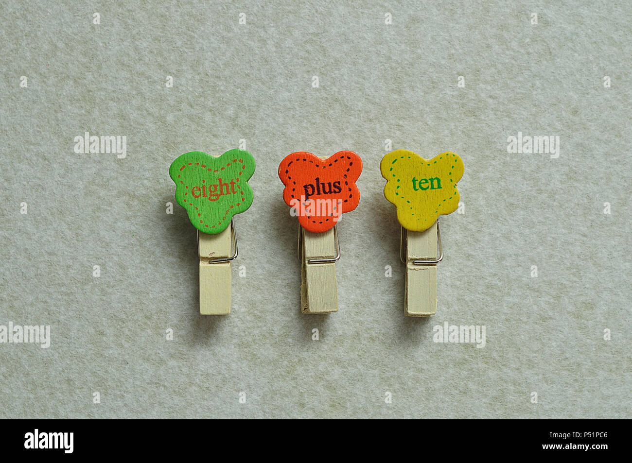 Eight plus ten on a white background Stock Photo - Alamy