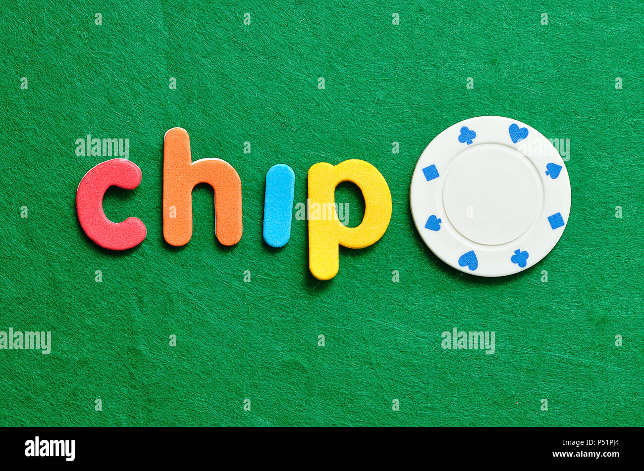 The word chip displayed with a poker chip on a green background Stock ...