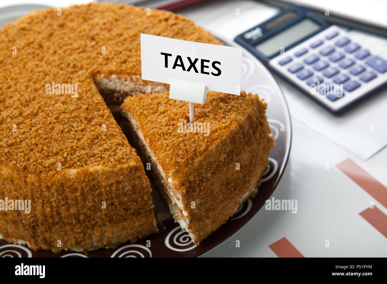office work and metaphor in the form of cake for the payment of taxes ...