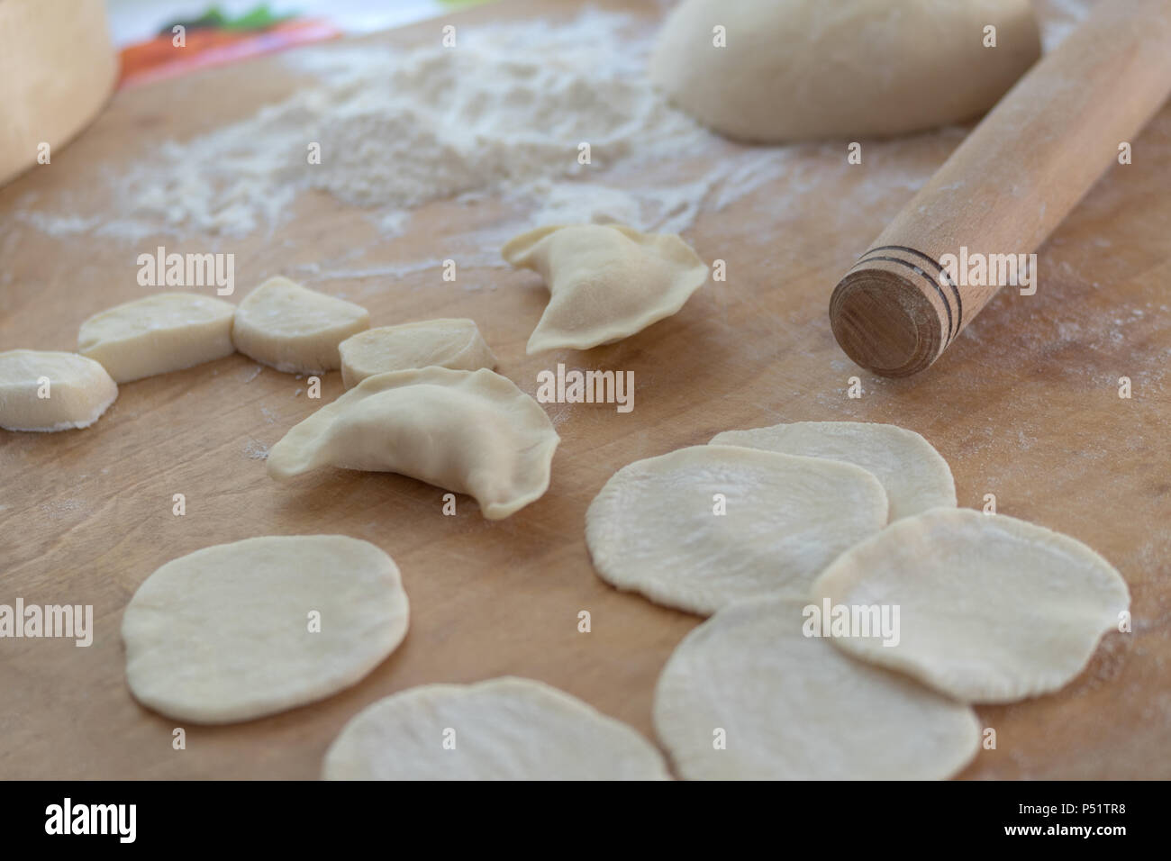Traditional Ukrainian dumplings Vareniki handmade Stock Photo - Alamy