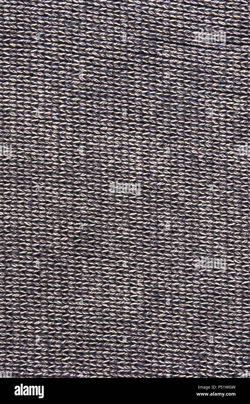 texture of a washed thick knit fabric, with decorative elements, seams ...