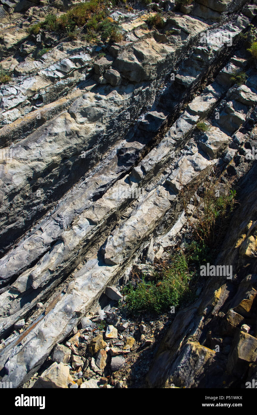 rock formations and stones of the sea coast, weathered and smoothed by ...