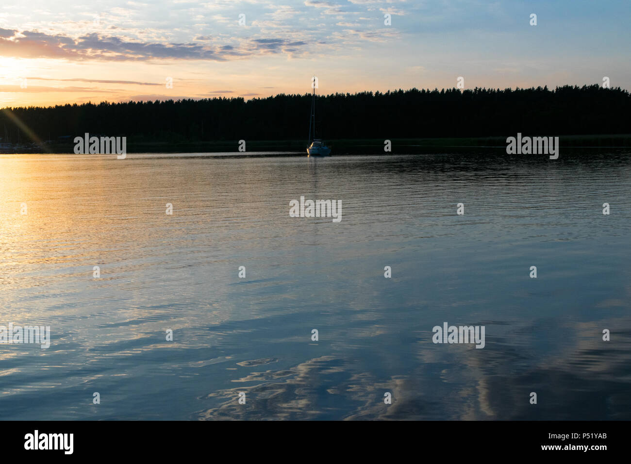 Sunrise, morning light, beautiful Fishing boats and forest far away ...