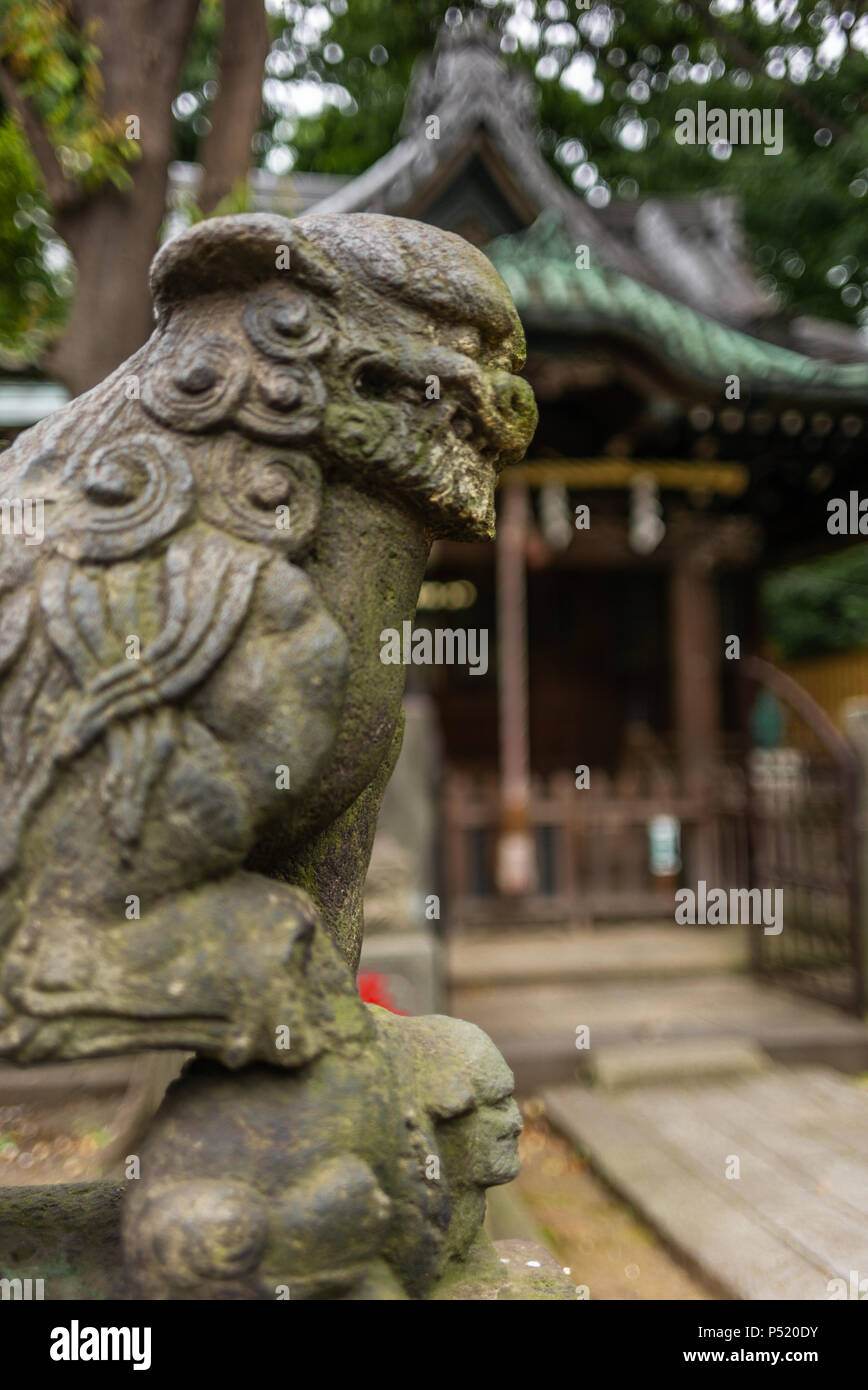 A stone dragon in a Shintoist shrine in Tokyo - 2 Stock Photo - Alamy