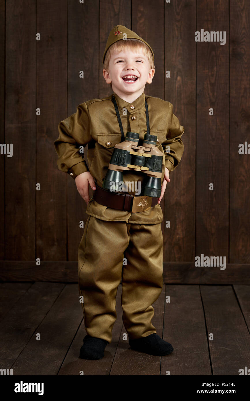children are dressed as soldier in retro military uniforms Stock Photo ...