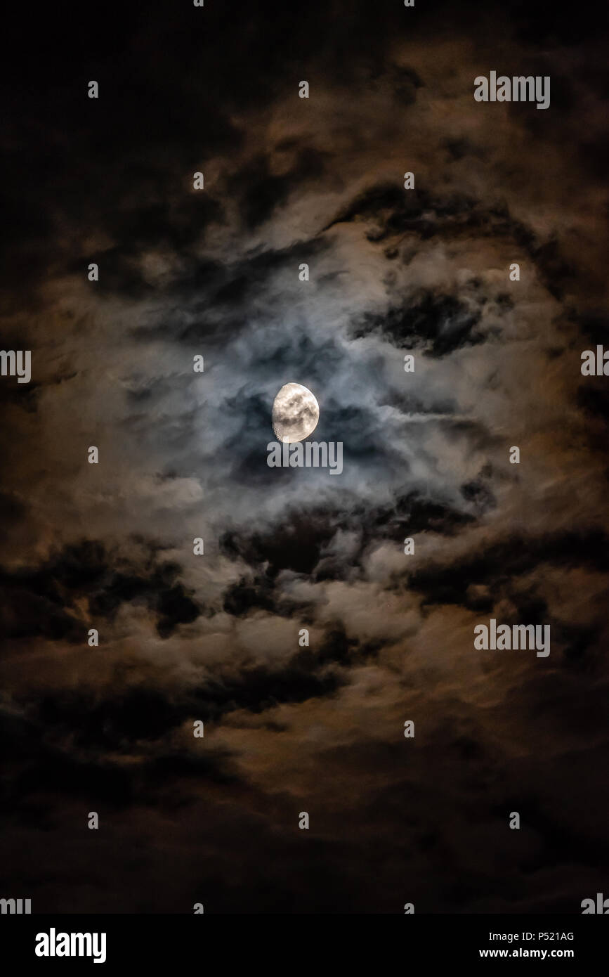 Moon In The Clouds Stock Photo - Alamy