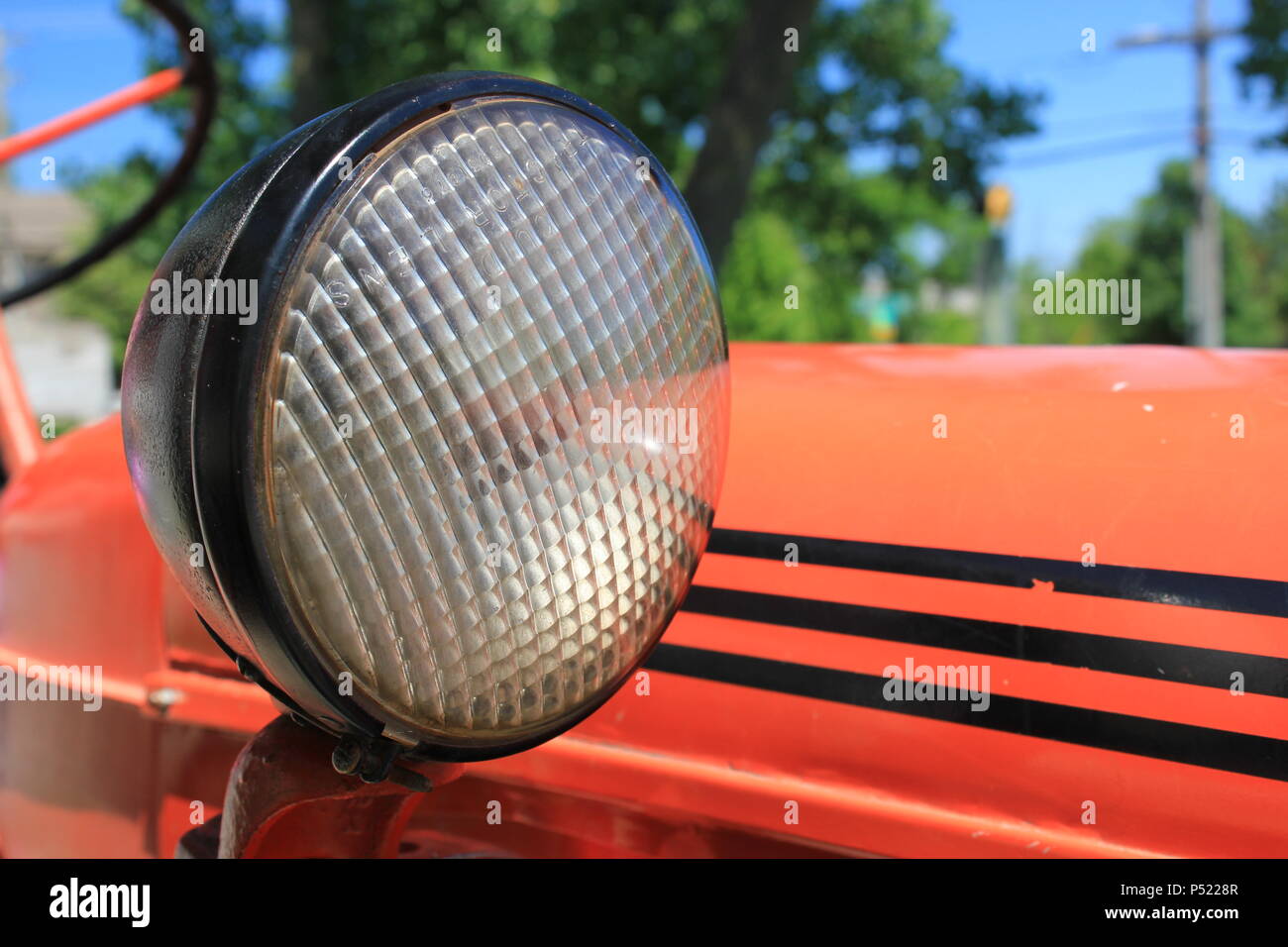 Headlight for a tractor Stock Photo - Alamy