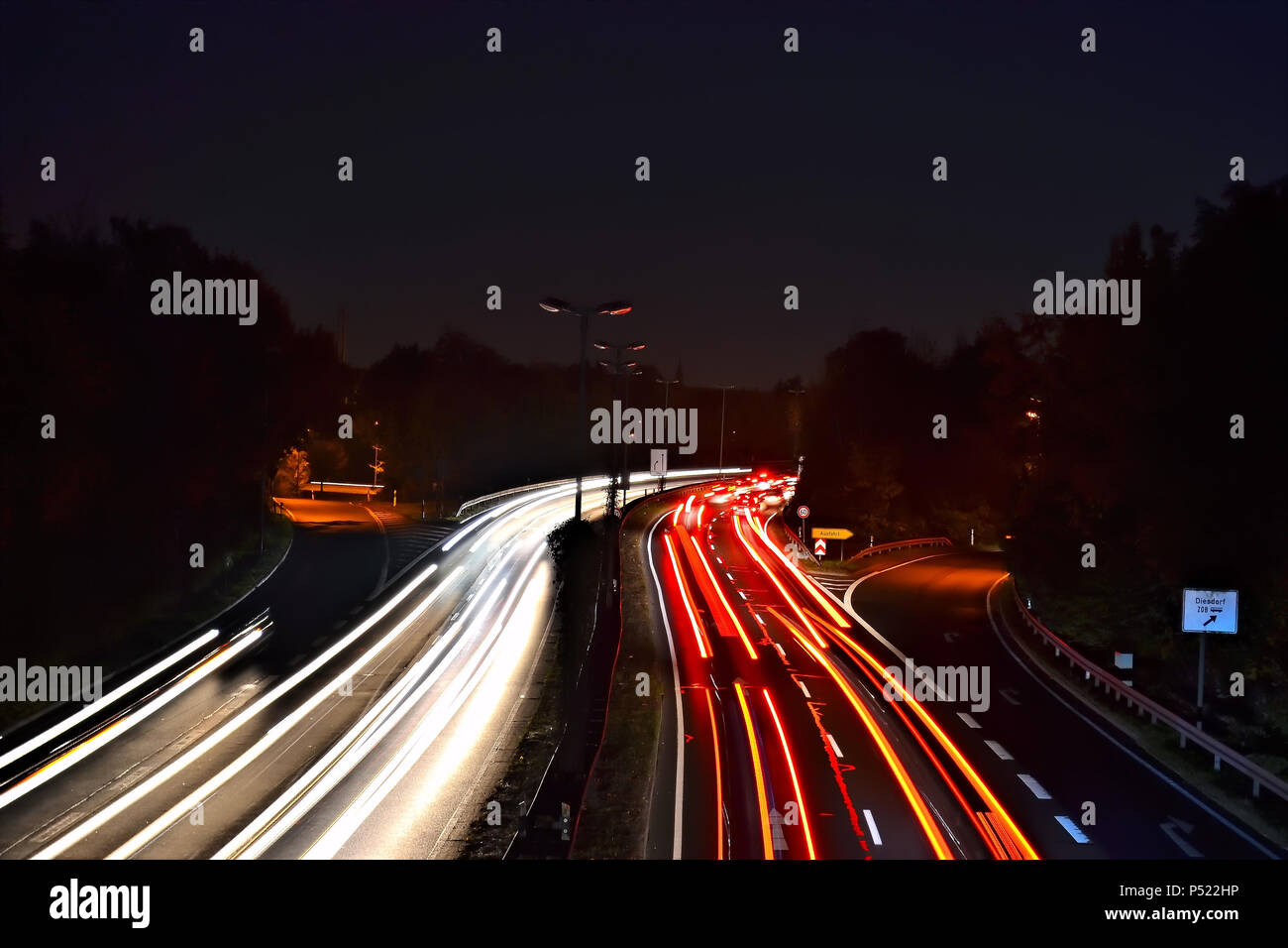 Traffic on a highway at night Stock Photo - Alamy