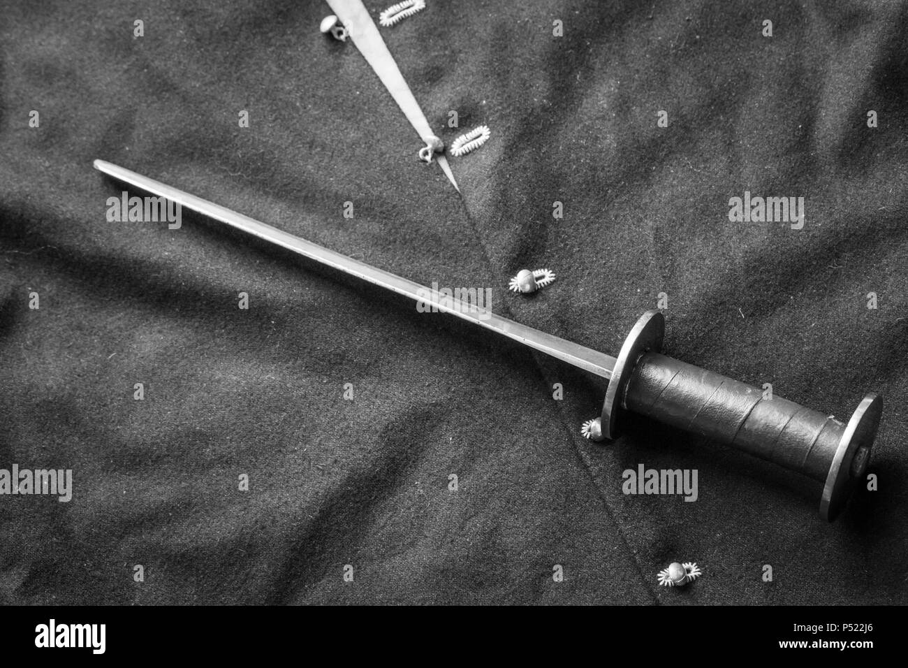 Man at arms, medieval rondel dagger and jacket Stock Photo - Alamy