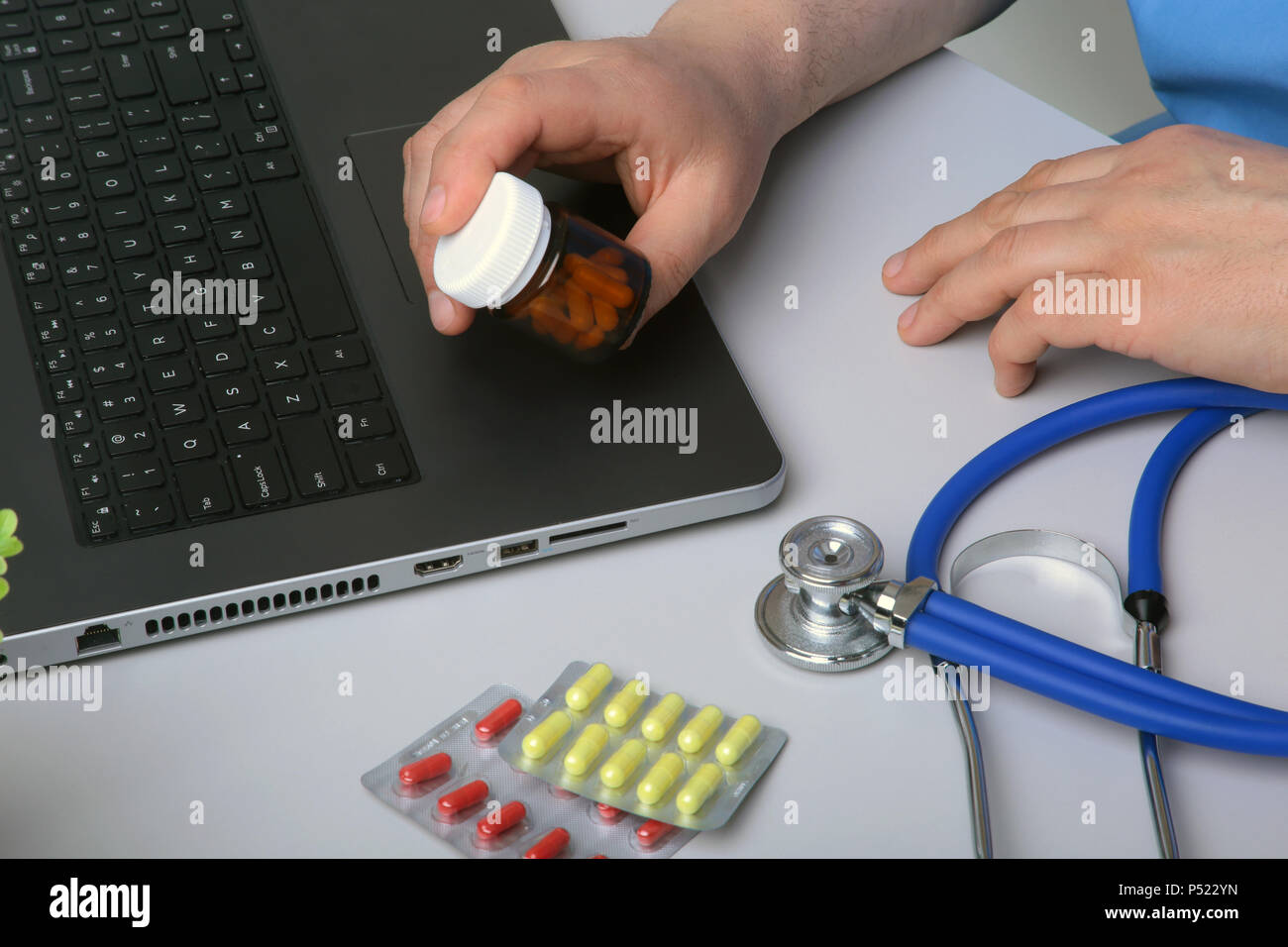 Doctor hand showing drug boxes at Office Desktop. Health care, Medical ...