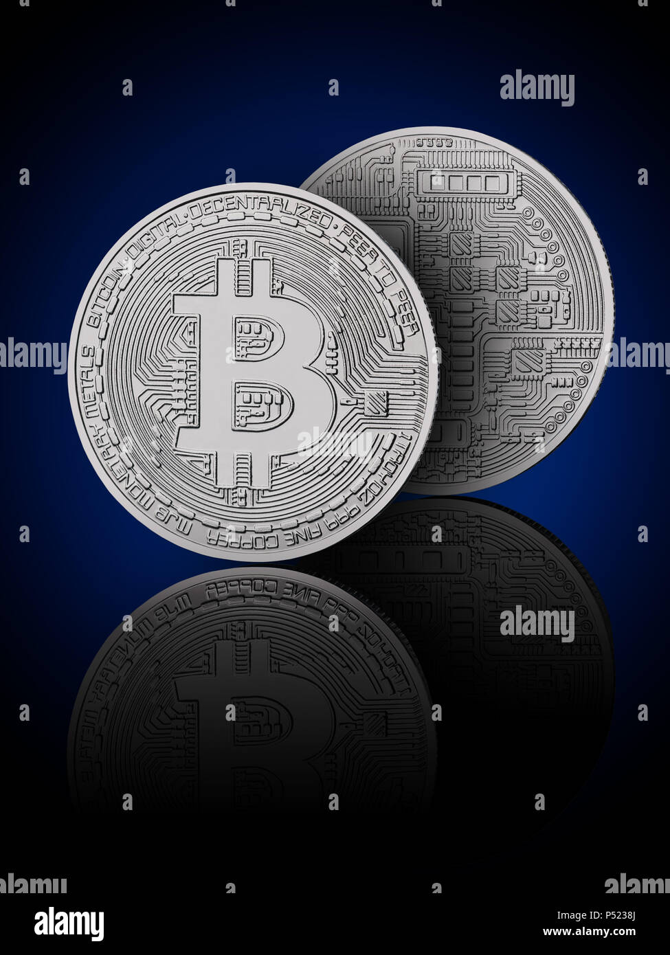 Bitcoin on black background with reflection. Obverse and reverse Stock ...