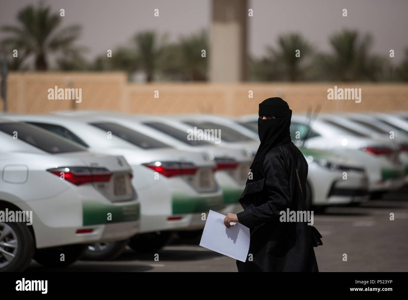 Riyadh, Saudi Arabia. 24th June, 2018. A Saudi woman arrives at the ...