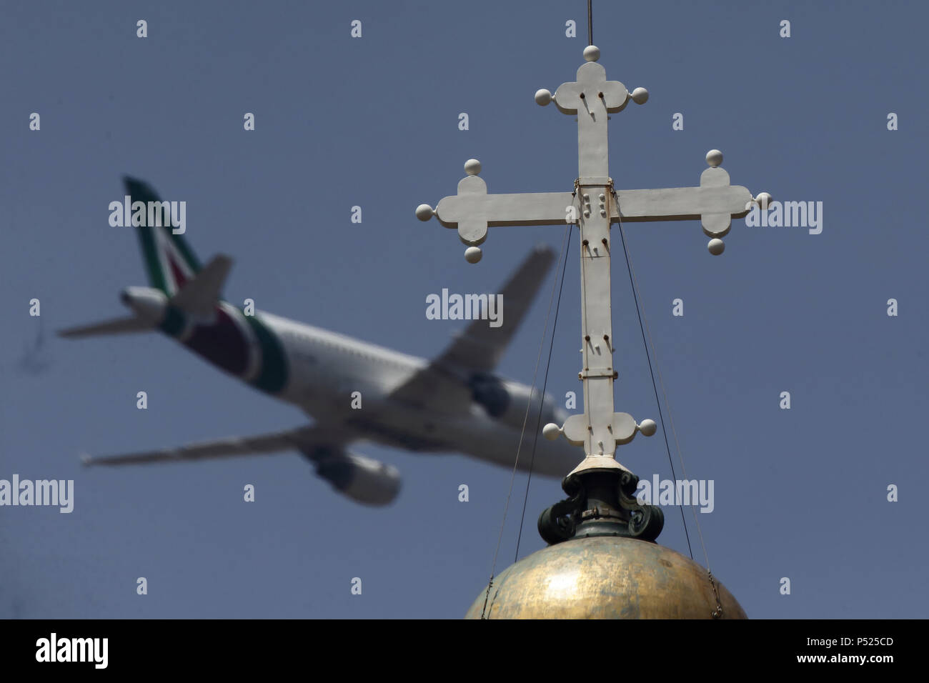 Vatican City (Holy See). 24th June, 2018. An airplane flies over the ...