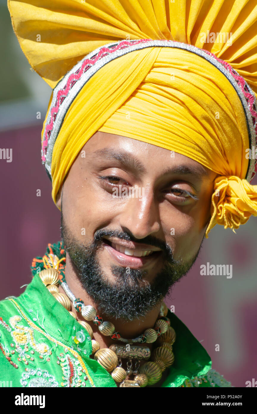 Glasgow, Scotland, UK. 24th June, 2018. A member of the traditional ...