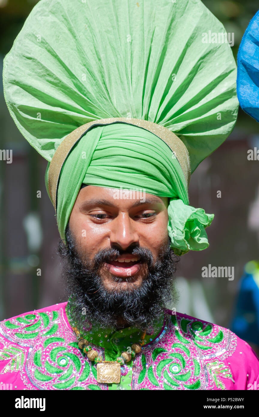 Glasgow, Scotland, UK. 24th June, 2018. A member of the traditional ...