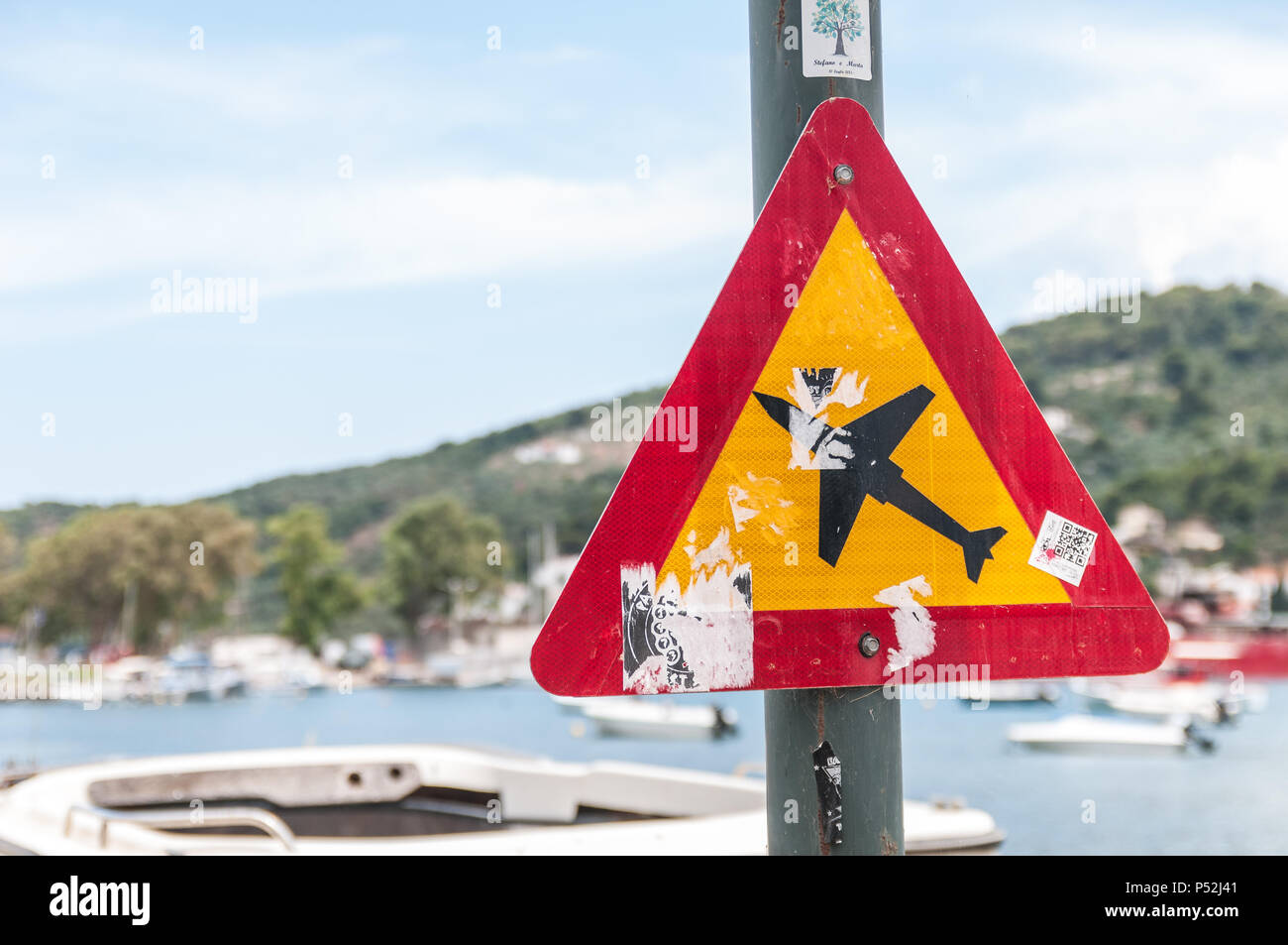 Skiathos, Greece. 15 June 2018: Traffic warning sign on the road ...