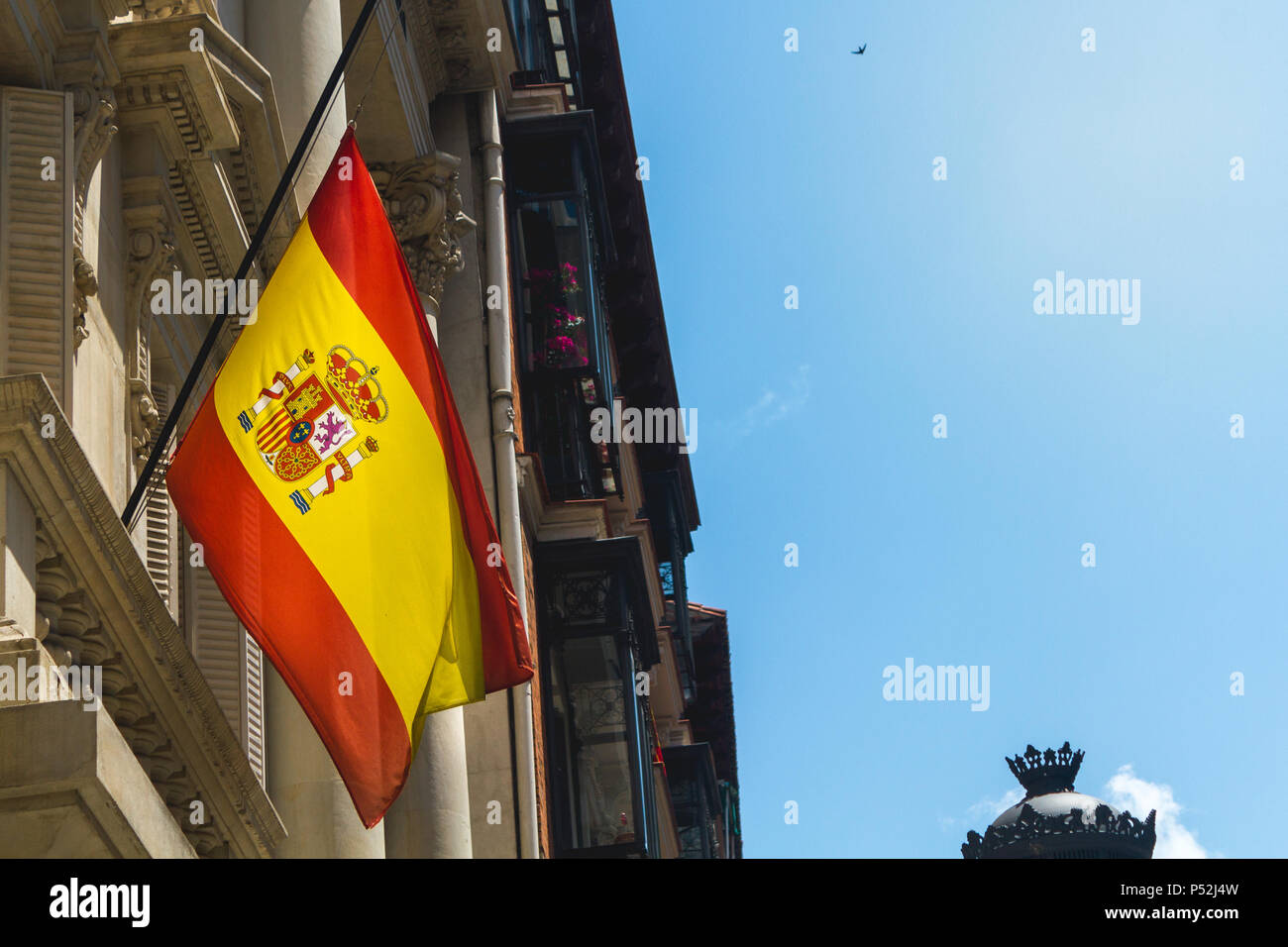 Spanish National Flag On Building in Madrid Stock Photo - Alamy