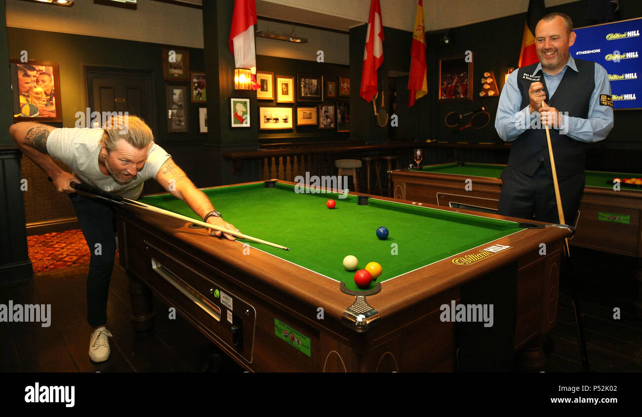 Robbie Savage (left) and Mark Williams play pool at the Lord Raglan Pub ...